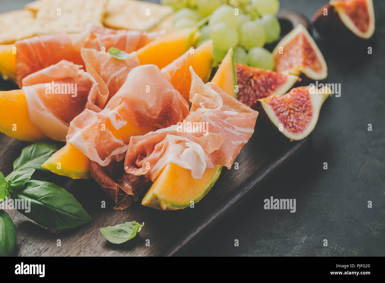 Tasty spanish traditional food - mediterranian appetizers with melon ...