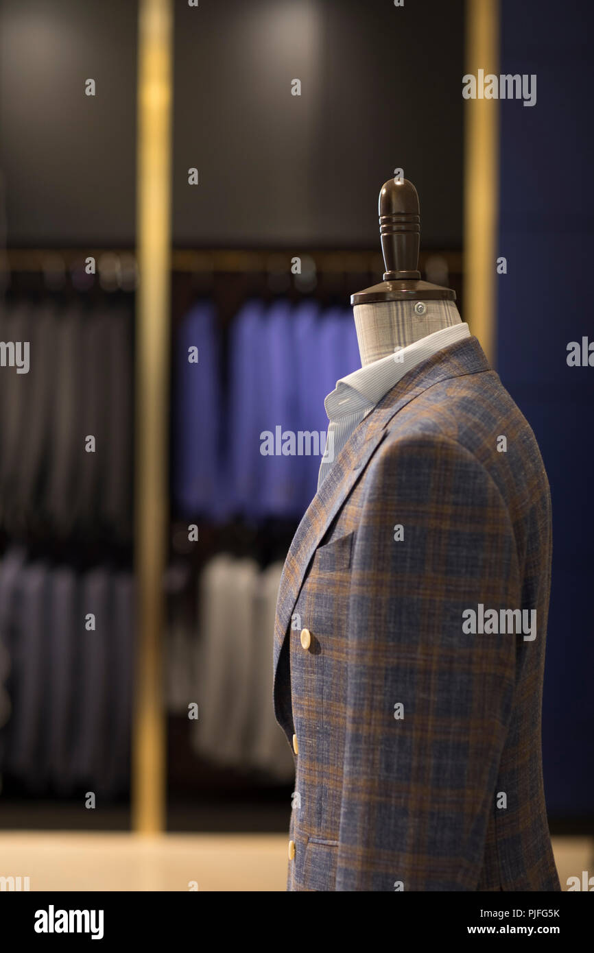Suits on display in menswear shop Stock Photo - Alamy