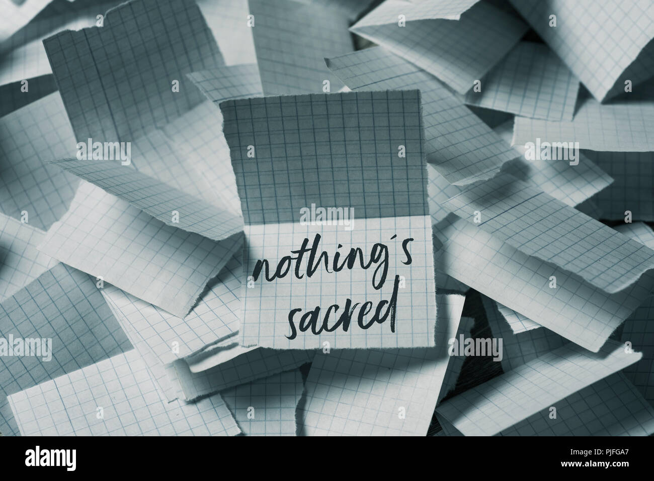 a pile of pieces of paper folded in half, and the text nothing is ...