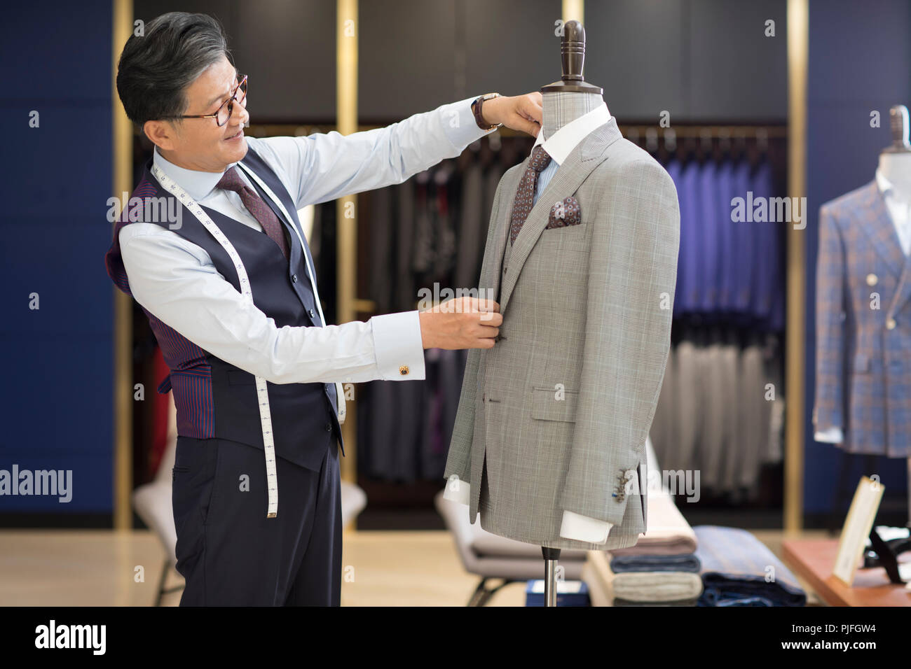 Confident fashion designer working Stock Photo - Alamy