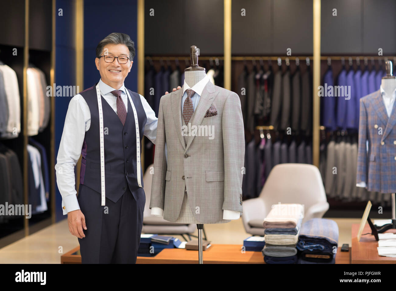 Confident fashion designer Stock Photo - Alamy