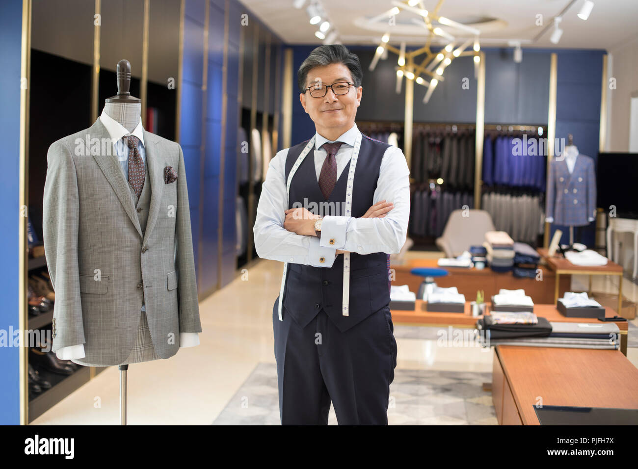 Portrait of confident fashion designer Stock Photo - Alamy