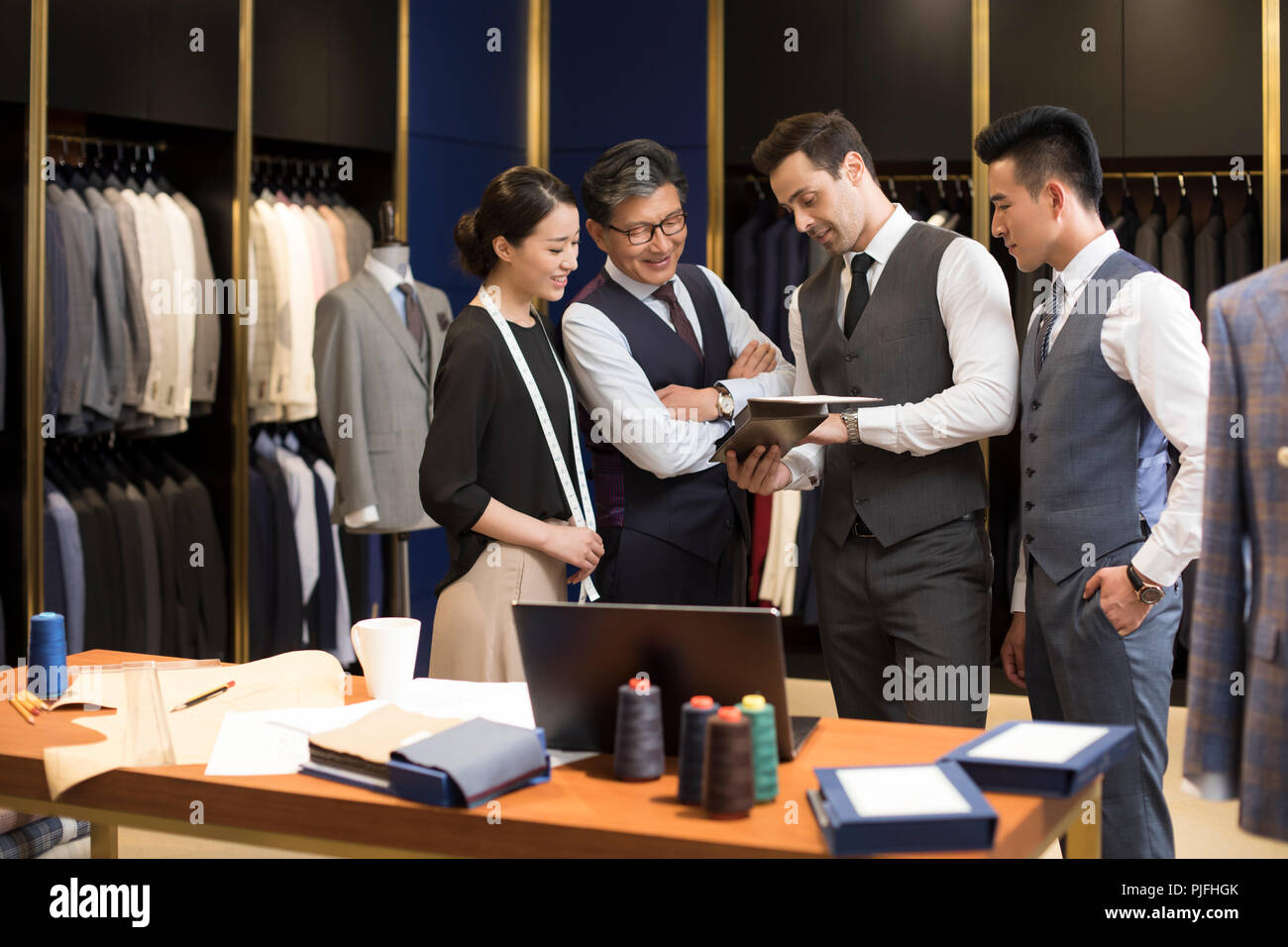 Group four designers working hi-res stock photography and images - Alamy