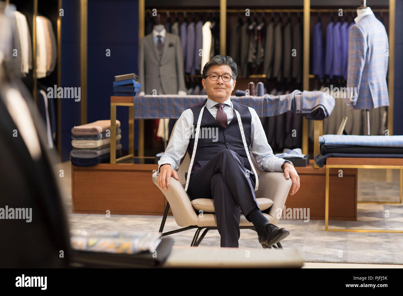 Portrait of confident fashion designer Stock Photo - Alamy