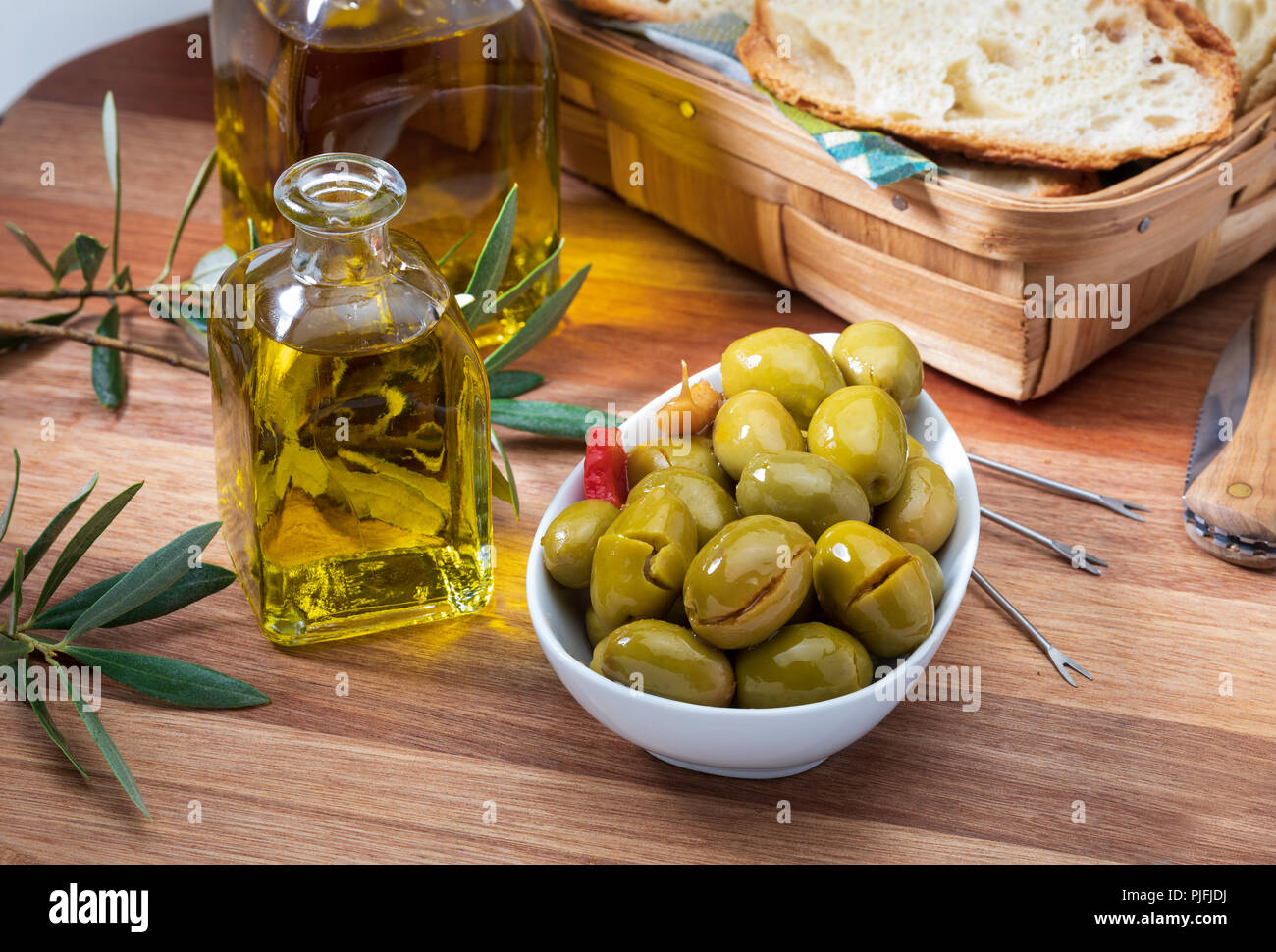 Artisan olives (canned in extra virgin olive oil, vinegar, spices) with ...