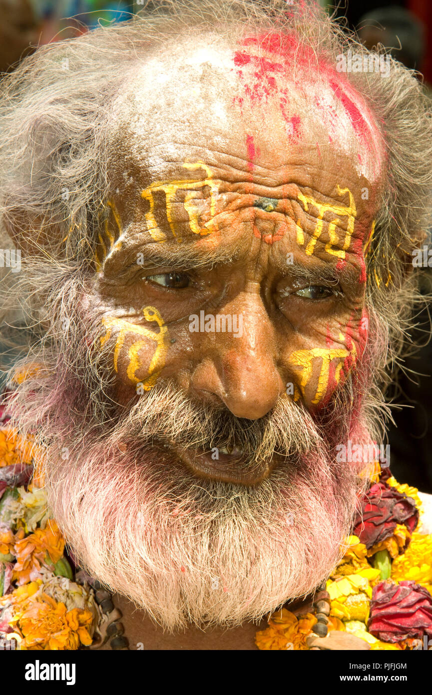 A portrait of a Hindu devotee they clelebrate Holi Festival writing ...