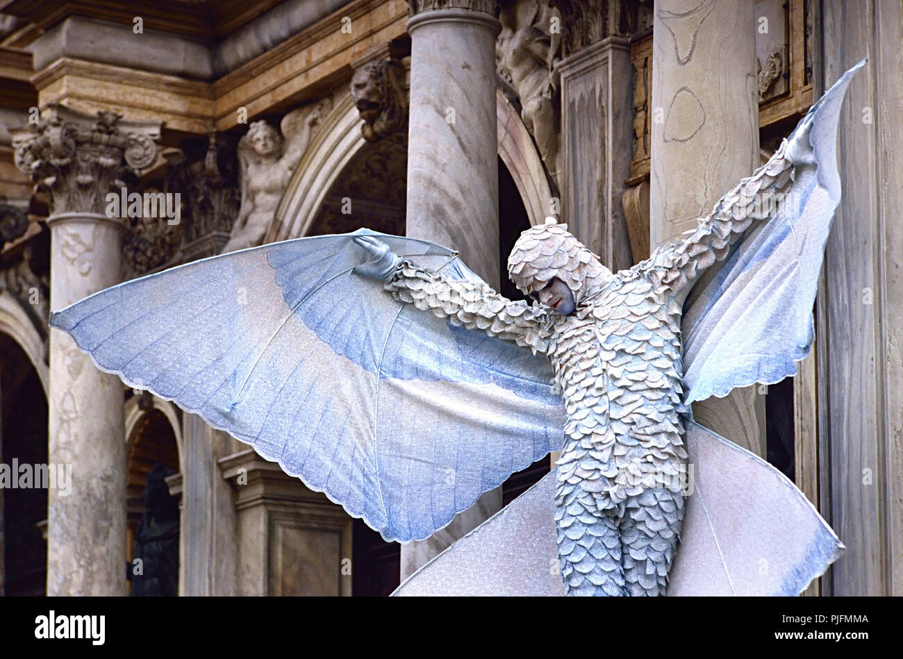 Europe, Italy, Venice Carnival. Tissue angel taking flight Stock Photo ...