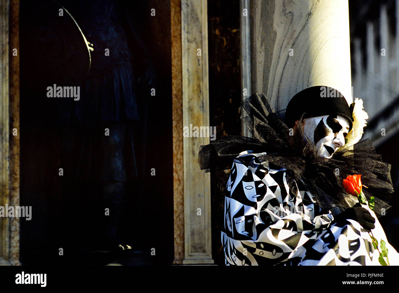 Europe, Italy, Venice Carnival. Pierrot leaning against a column ...