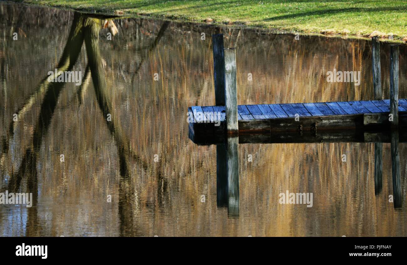 Dock in Pond, Water Reflection Stock Photo - Alamy