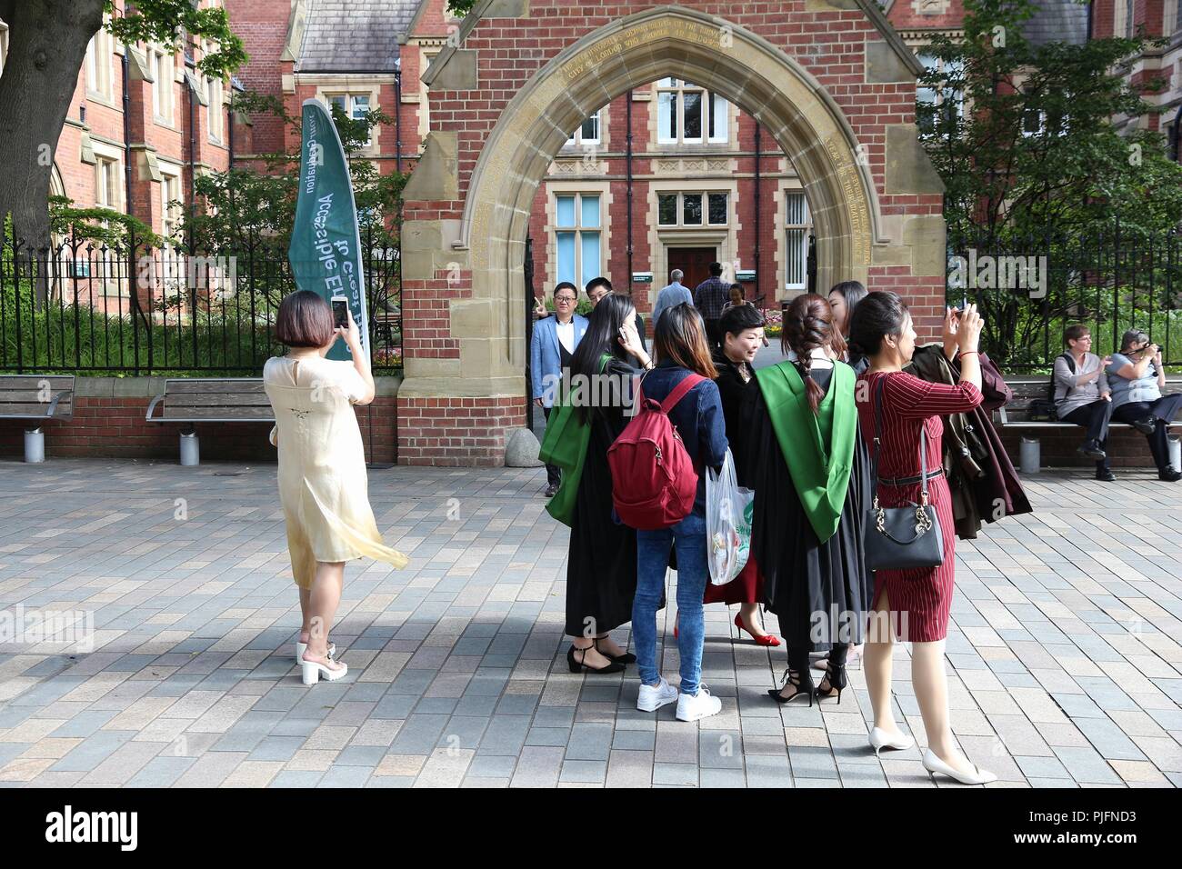 LEEDS, UK - JULY 12, 2016: Graduates cheer at graduation day at the ...