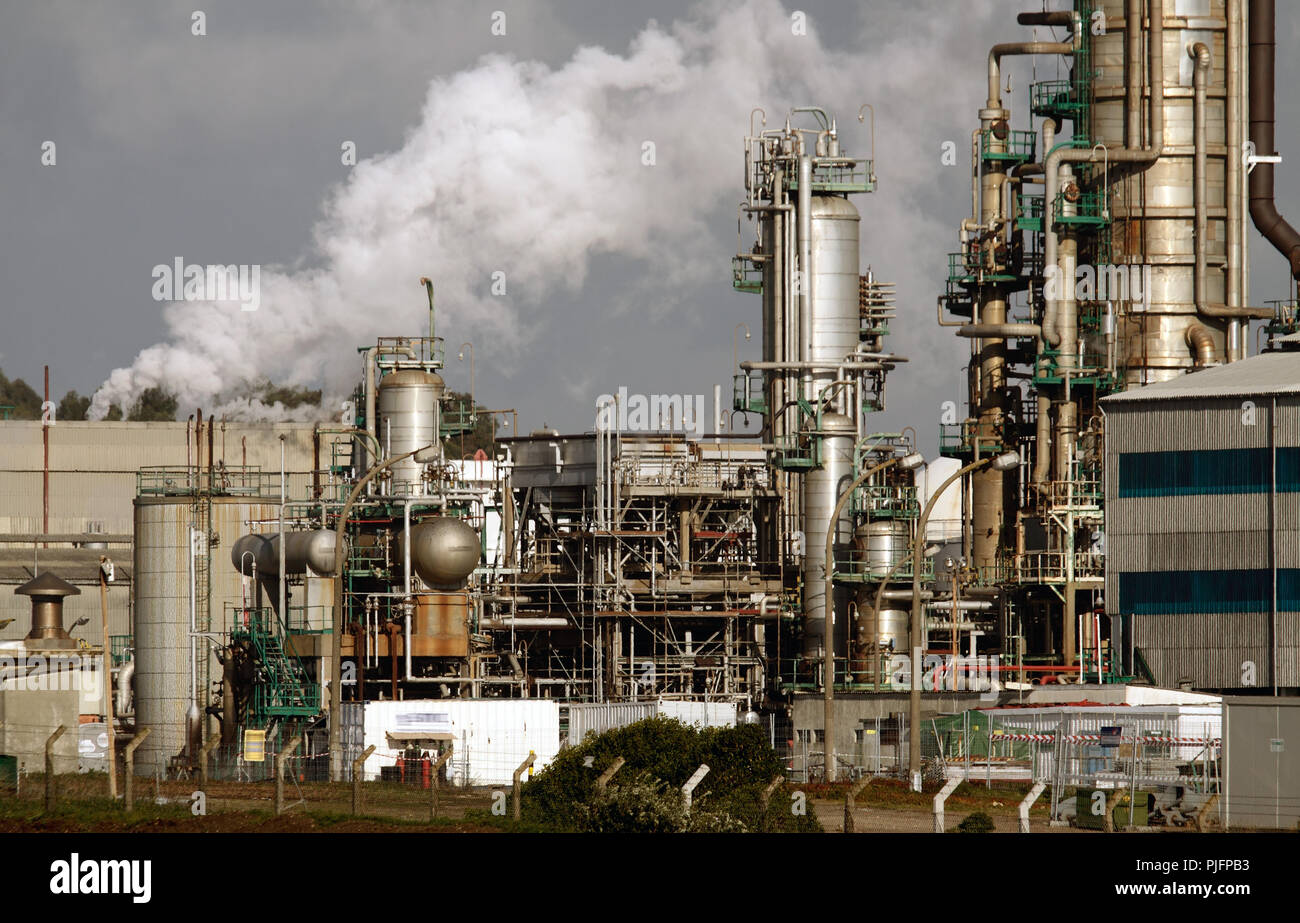 Part of a big oil refinery seeing steam Stock Photo - Alamy