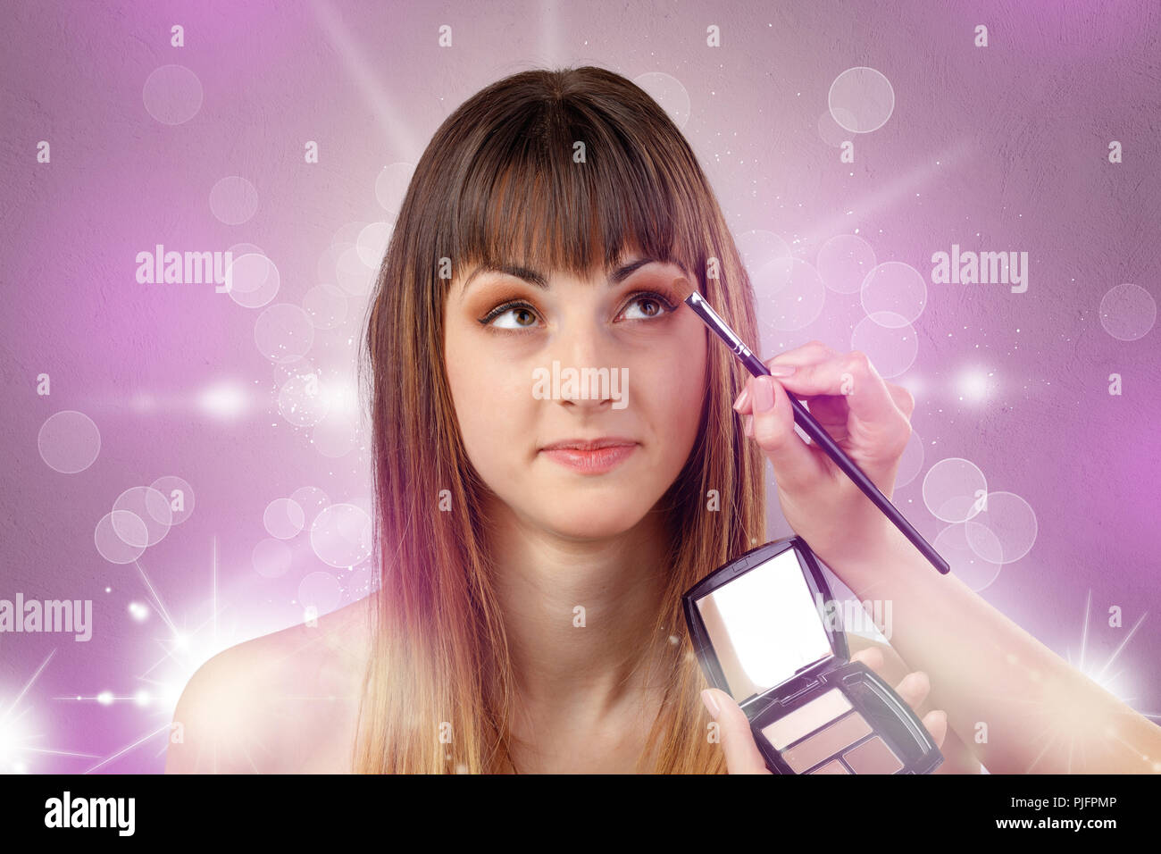 Young woman portrait with shiny pink beauty salon concept and personal ...