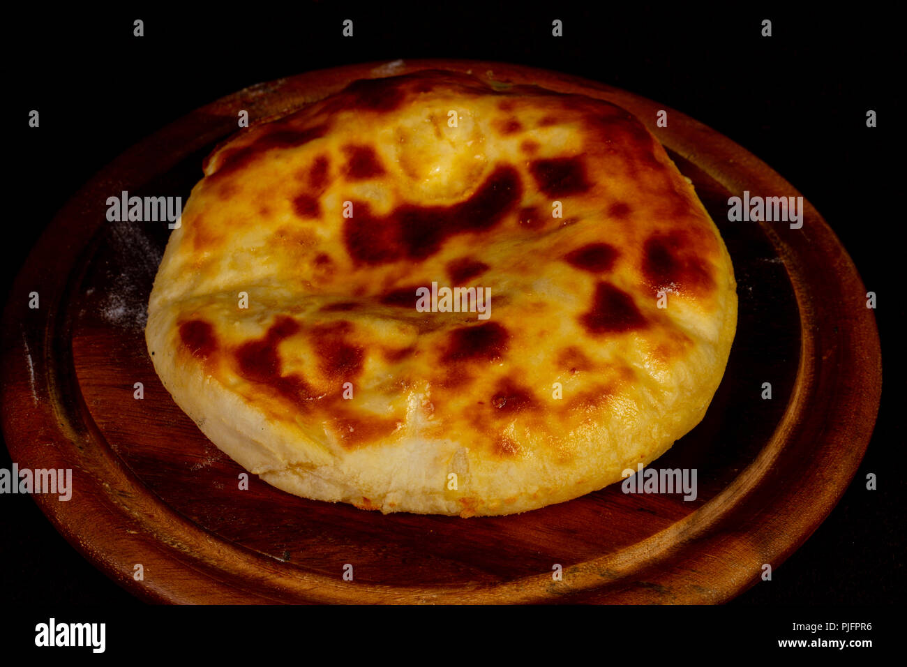 Georgian traditional hachapuri with cheese Stock Photo - Alamy