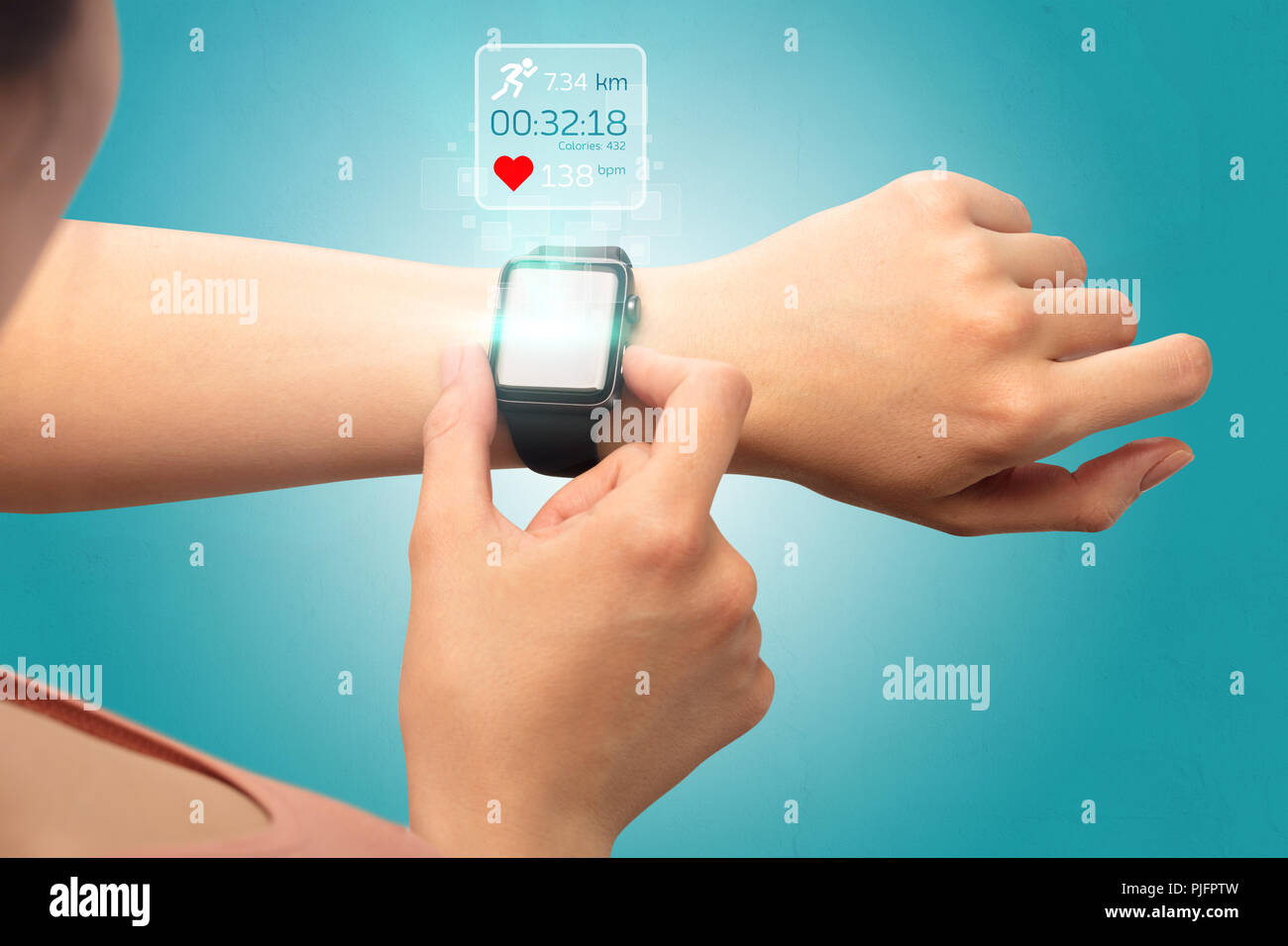 Female hand with smartwatch and running concept above Stock Photo - Alamy