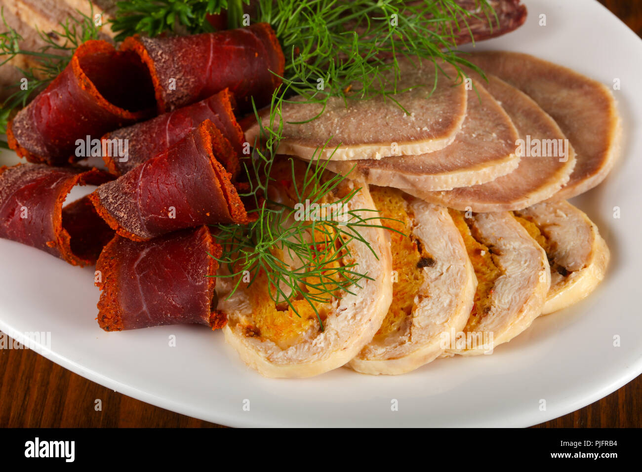 Meat plate - tongue, beef, chicken Stock Photo - Alamy