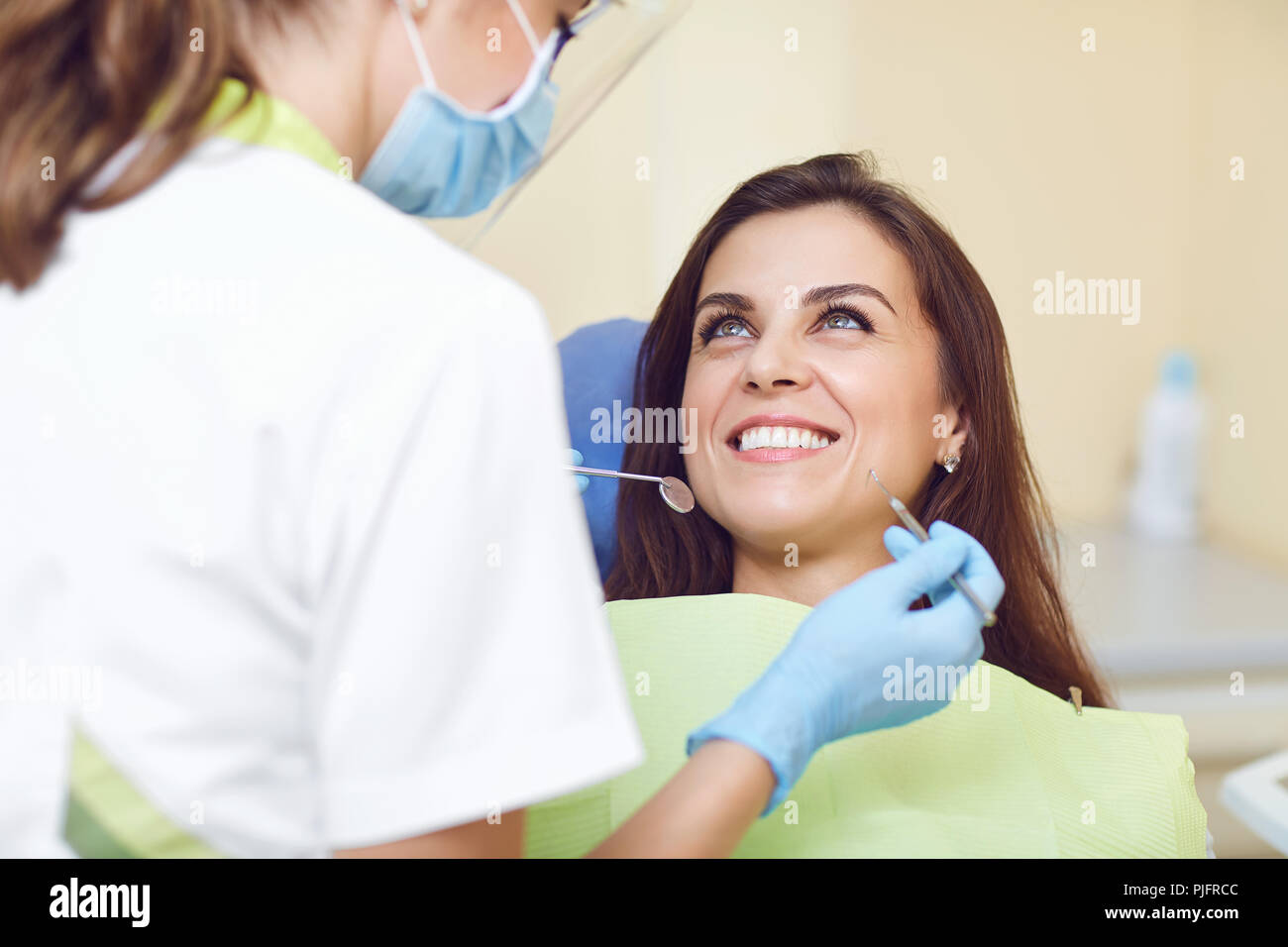 A woman and a dentist in a dental clinic Stock Photo - Alamy