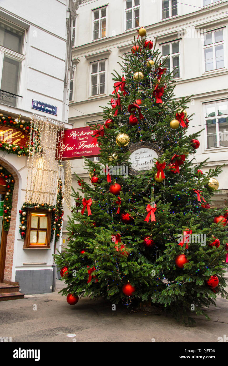 Christmas tree in red ribbons and balls in Vienna, Austria Stock Photo ...