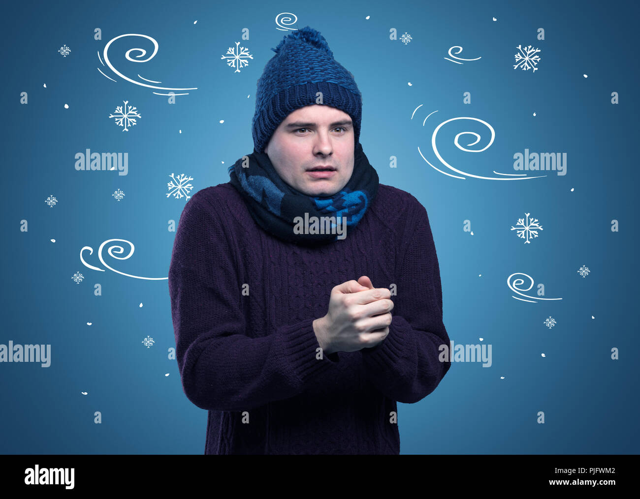 Young hipster frozen boy with doodled snowflakes and windy concept ...