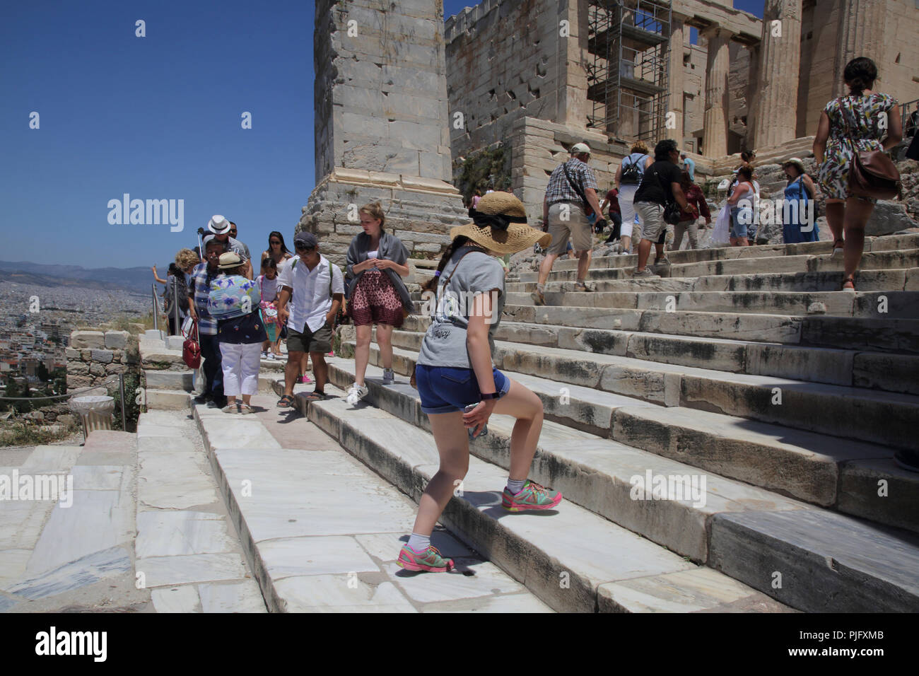 Tourists climbing stairs hi-res stock photography and images - Alamy