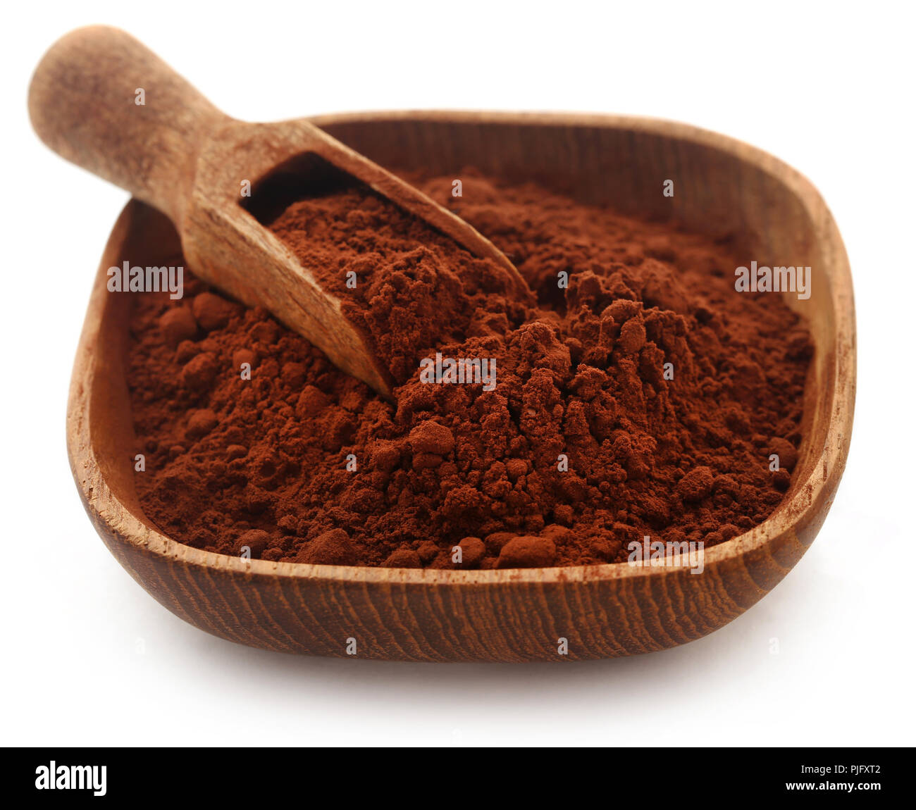 Cacao Powder with bowl and scoop over white background Stock Photo - Alamy