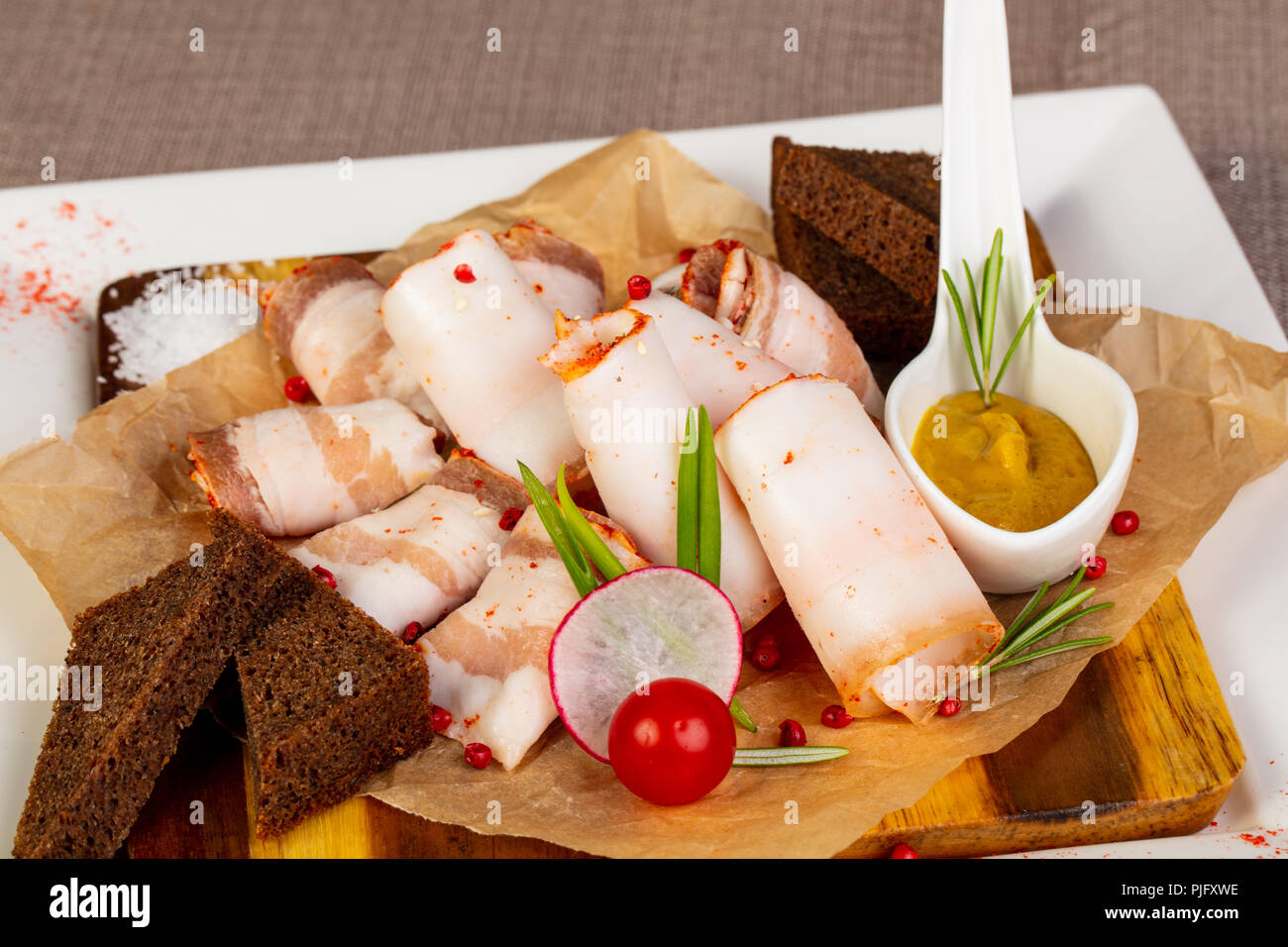 Pork fat plate with bread and onion Stock Photo - Alamy