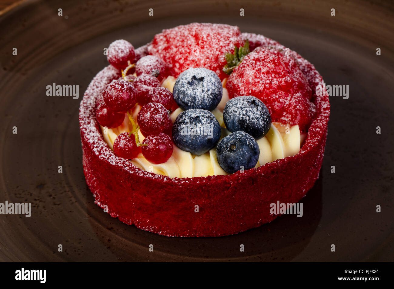 Cake with berries and cream Stock Photo - Alamy