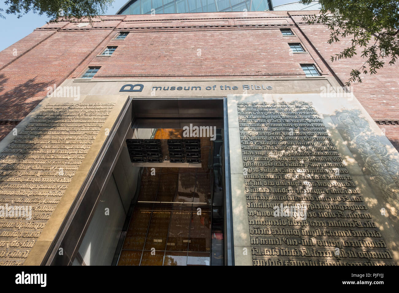Dramatic entrance of Museum of the Bible, Washington, DC. Bronze plates ...
