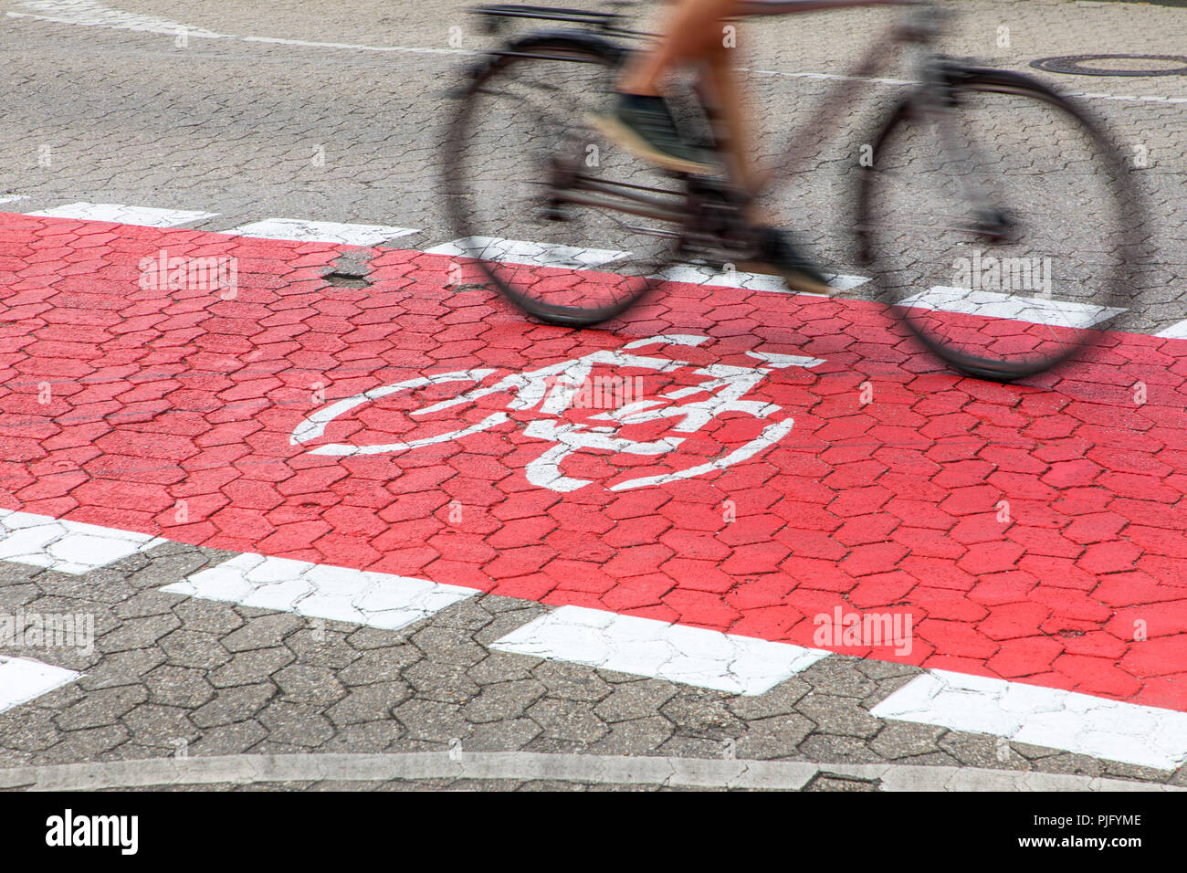 Bike path, extra large marked bicycle lane on a street, in Bochum ...