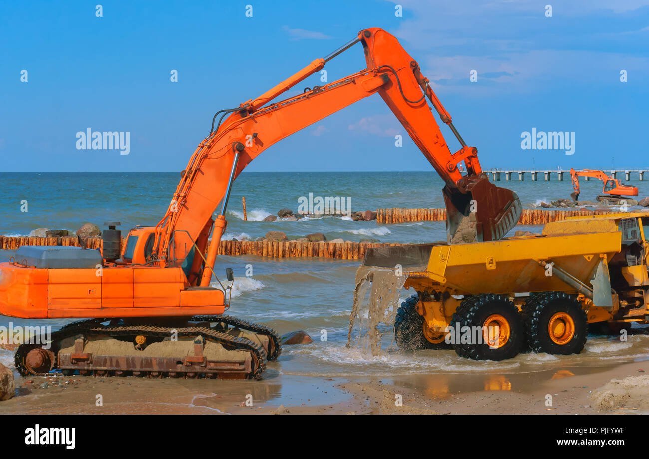 construction of breakwaters at sea, construction equipment in the ...