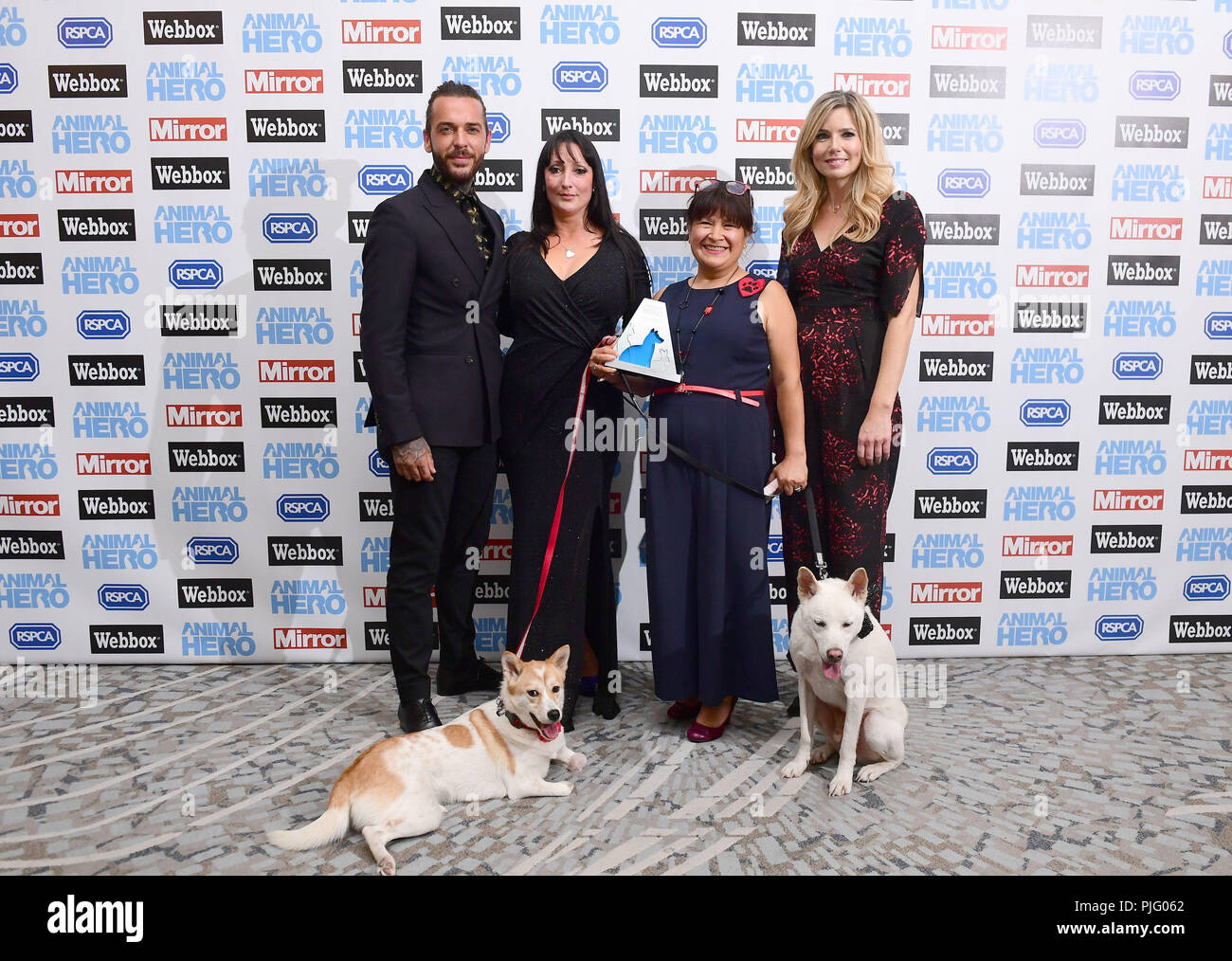 Braveheart (dog left) with the Inspirational animal of the Award with ...