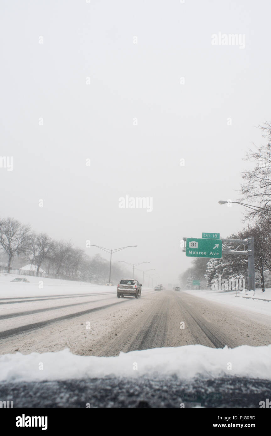 Driving in the snow on NY 490 in Downtown Rochester, New York USA Stock ...