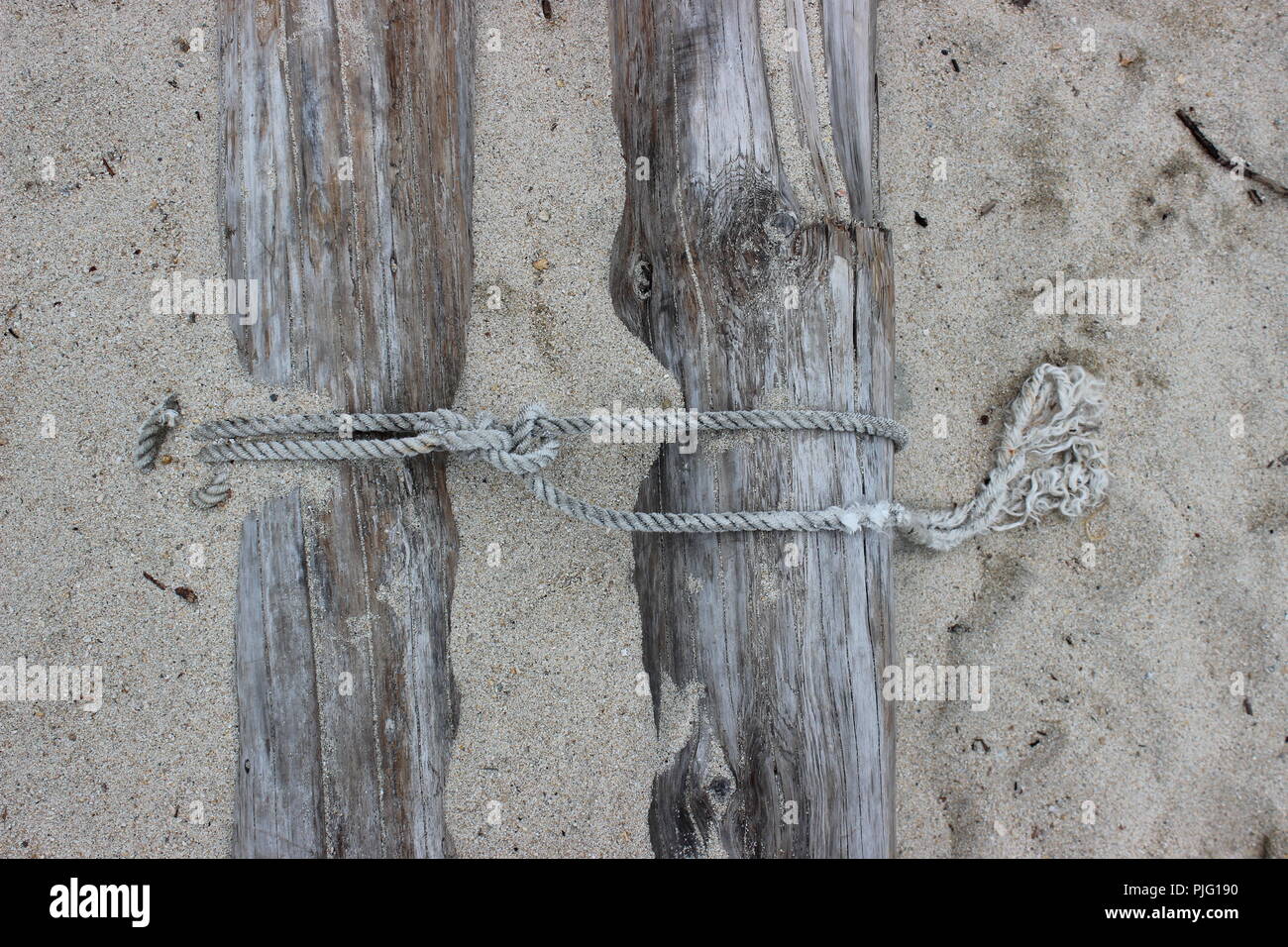 Rope around logs Stock Photo - Alamy