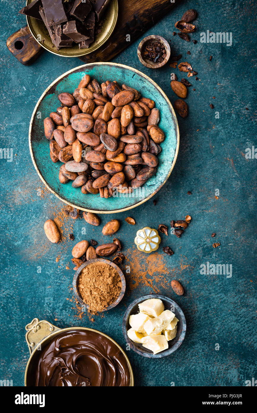 Cocoa. Cocoa beans, dark bitter chocolate chunks, cacao butter and ...