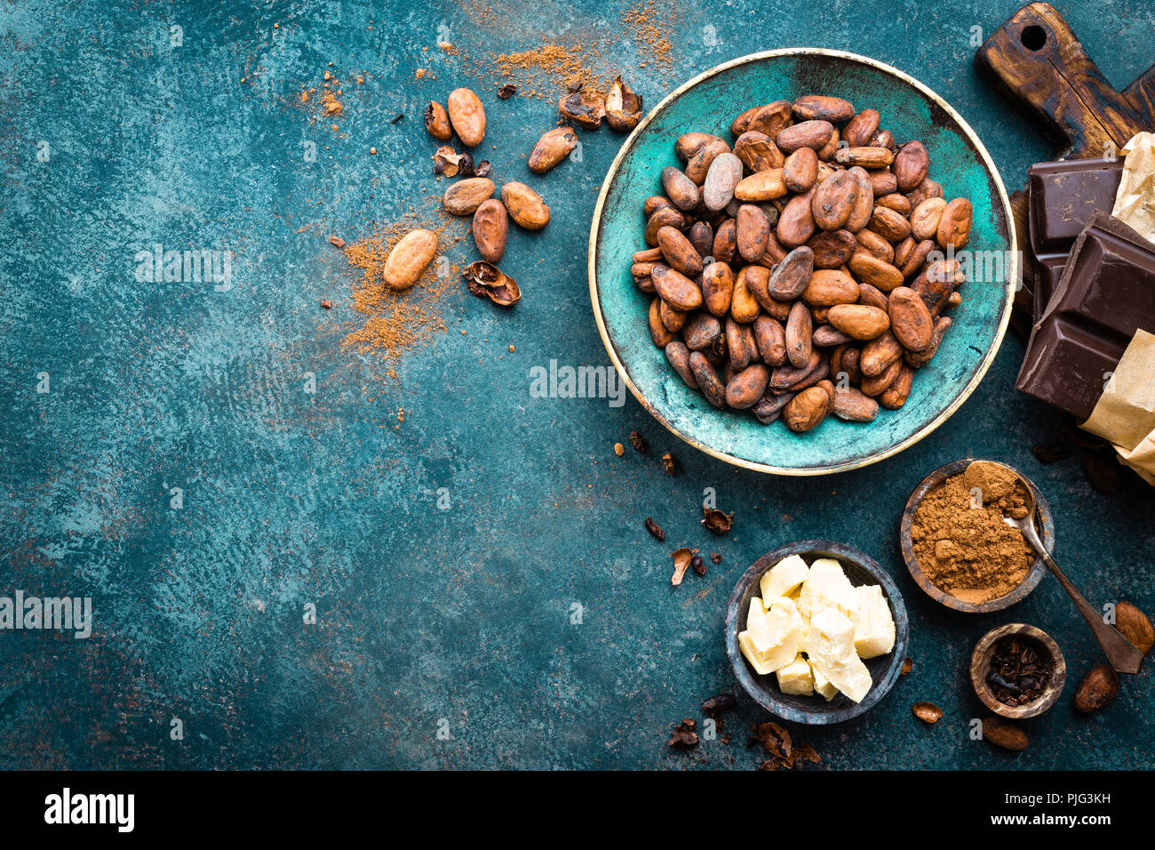 Cocoa. Cocoa beans, dark bitter chocolate chunks, cacao butter and ...