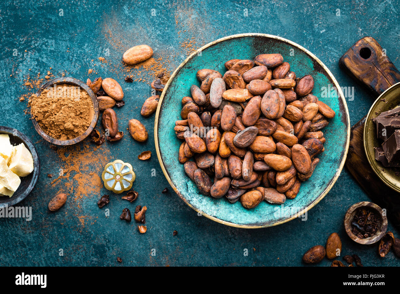 Cocoa. Cocoa beans, dark bitter chocolate chunks, cacao butter and ...