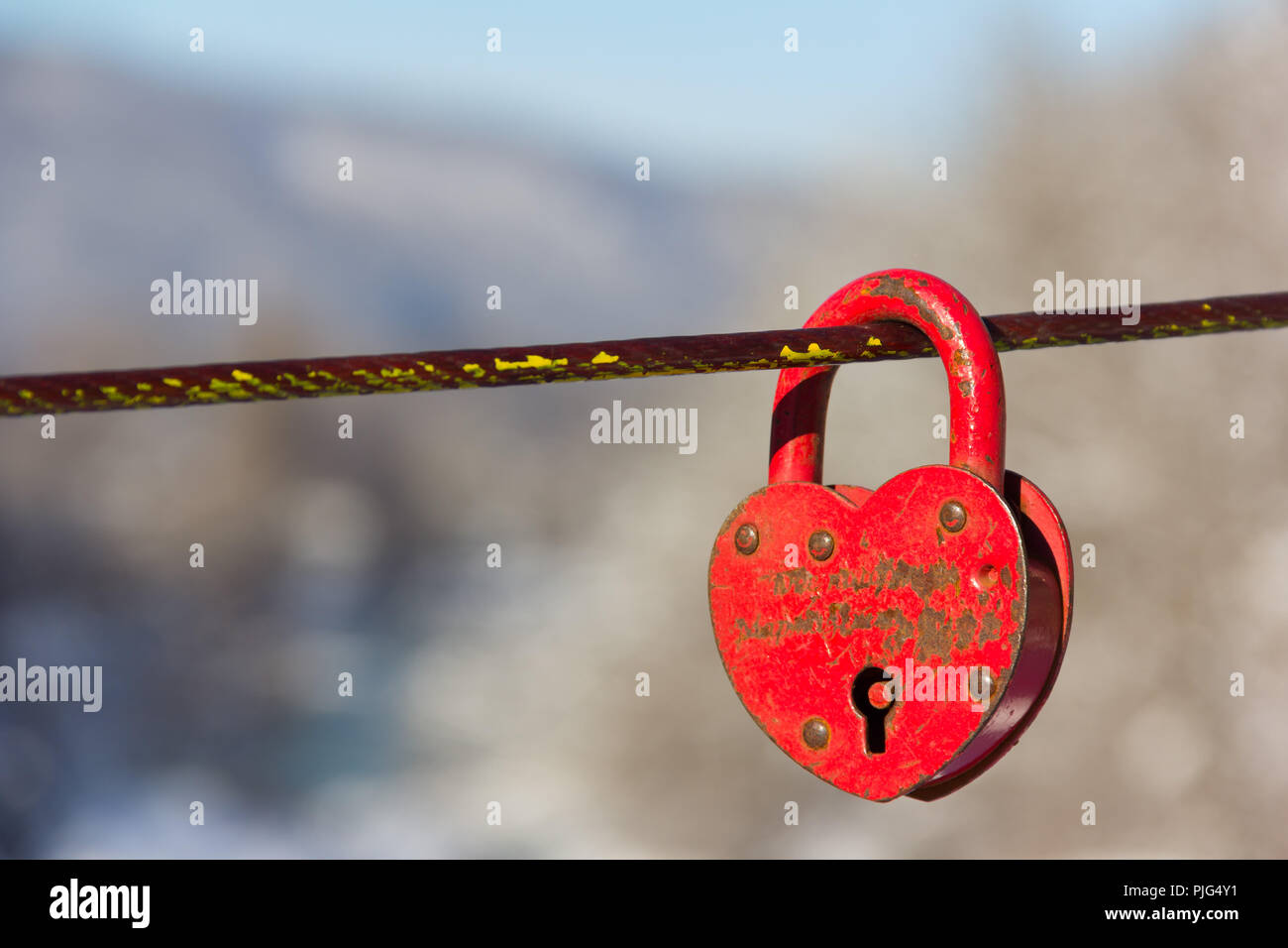 old closed red padlock in heart shape closeup Stock Photo - Alamy