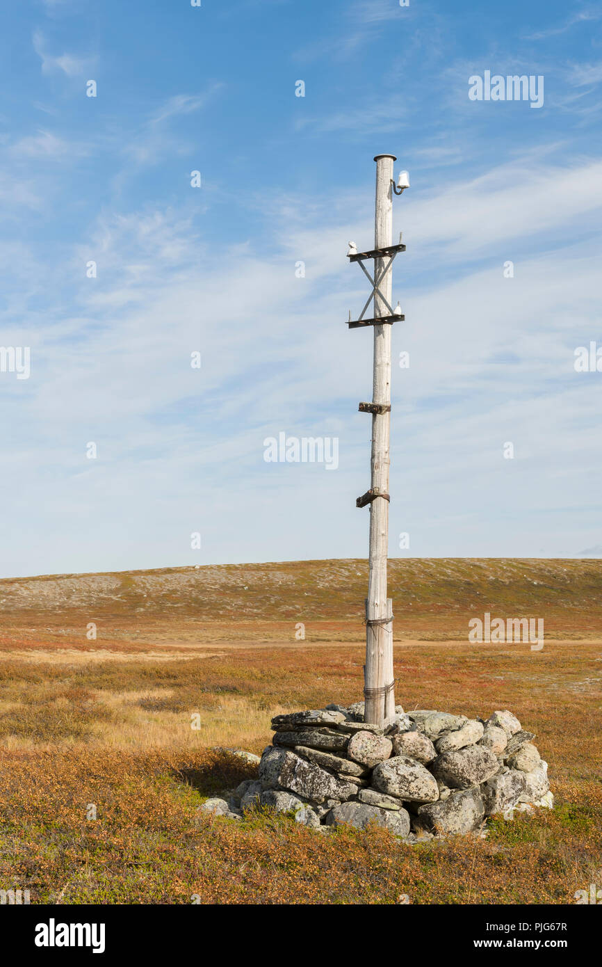 Old telegraph post at the mountain plateau "Finnmarksvidda" in Alta ...