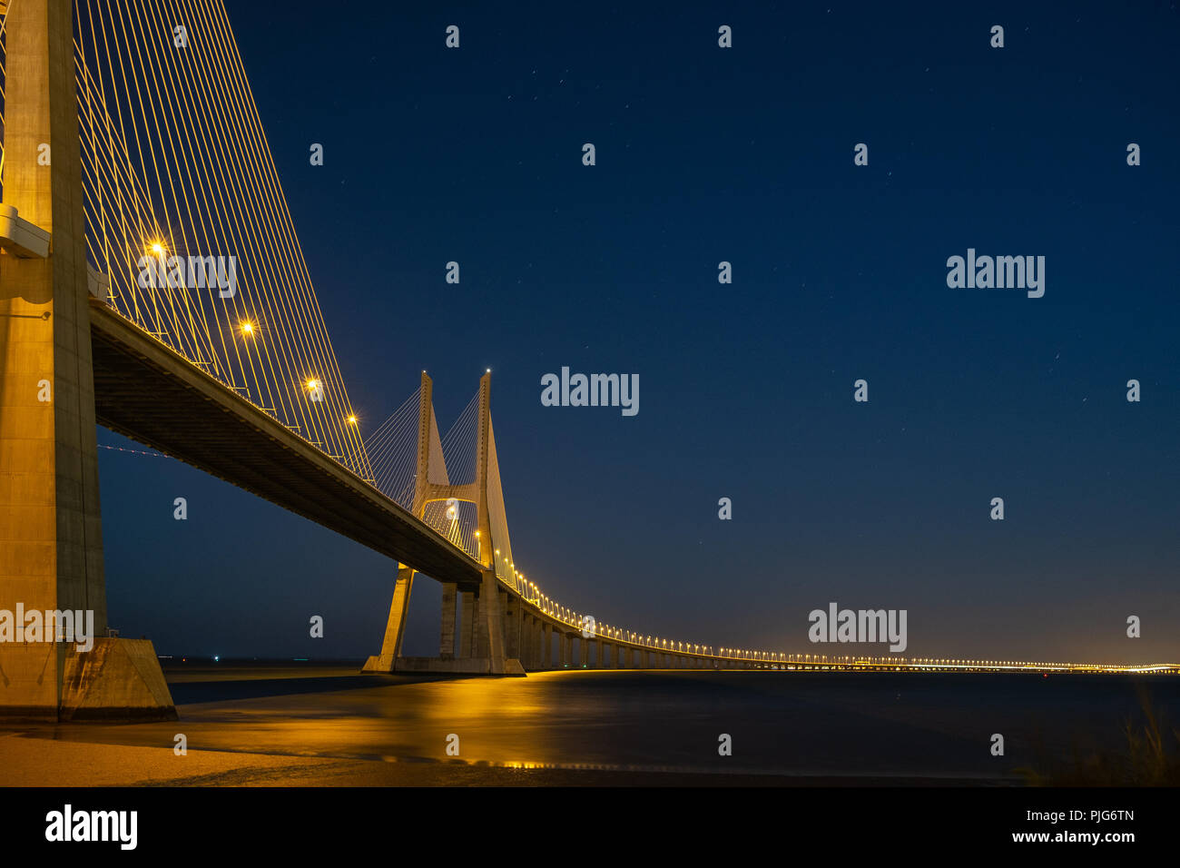 Part of Vasco da Gama's Bridge in Lisbon, during night Stock Photo - Alamy