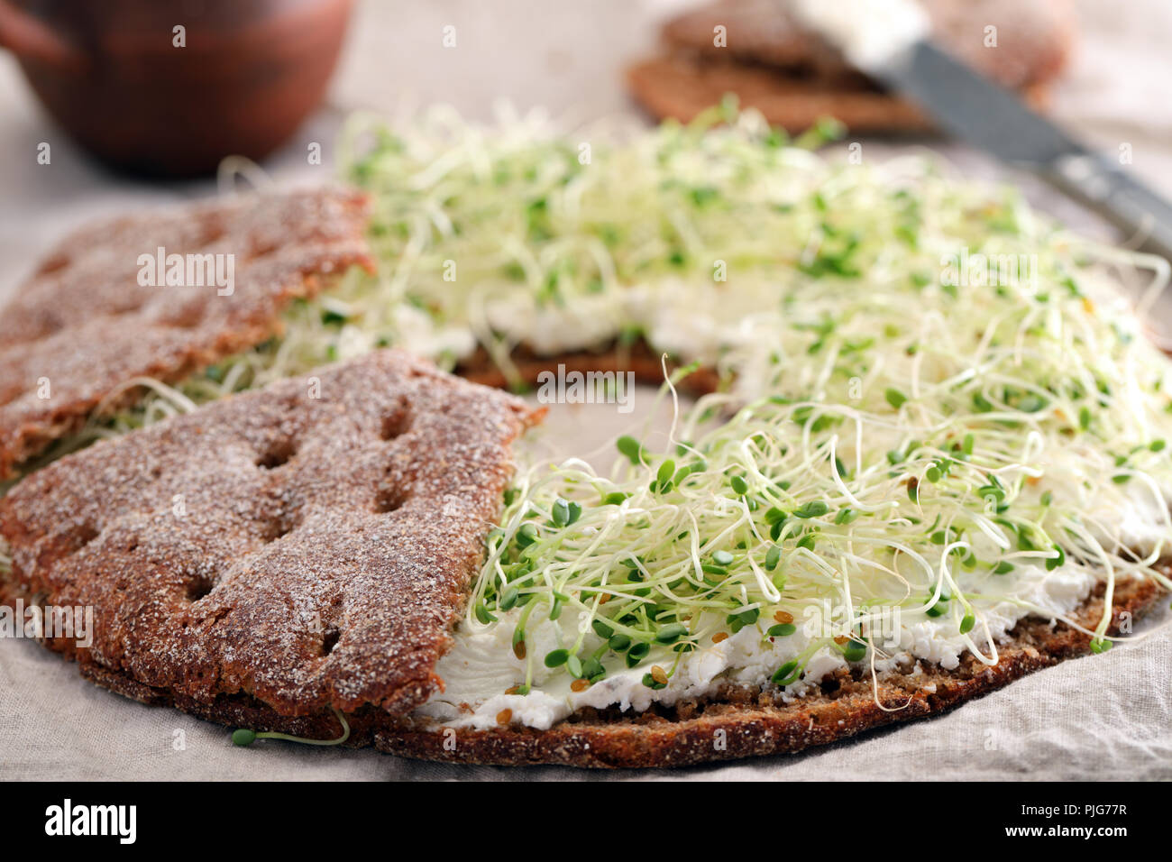 Finnish sandwich with cream cheese, cress, and round bread Reikaleipa ...