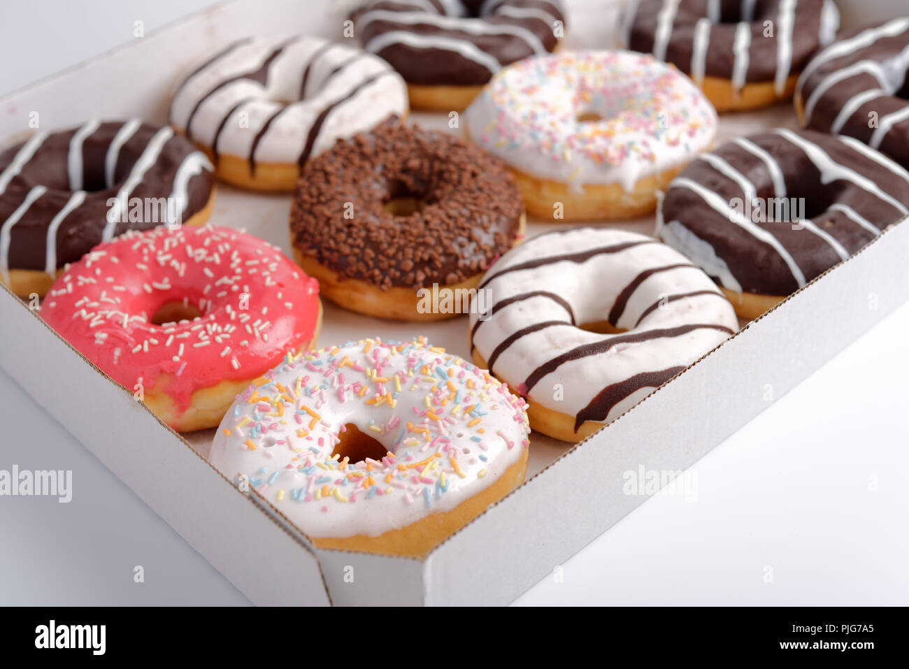 Glazed donuts in a box hi-res stock photography and images - Alamy