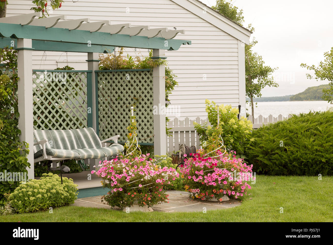 Quaint backyard, nicely maintained, on Mackinac Island on Lake Huron ...