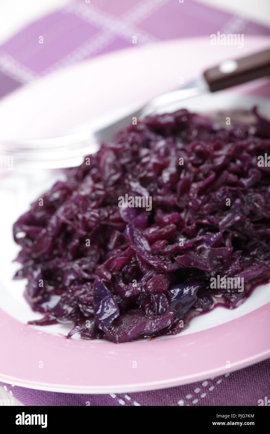 Braised red cabbage on a plate closeup Stock Photo - Alamy