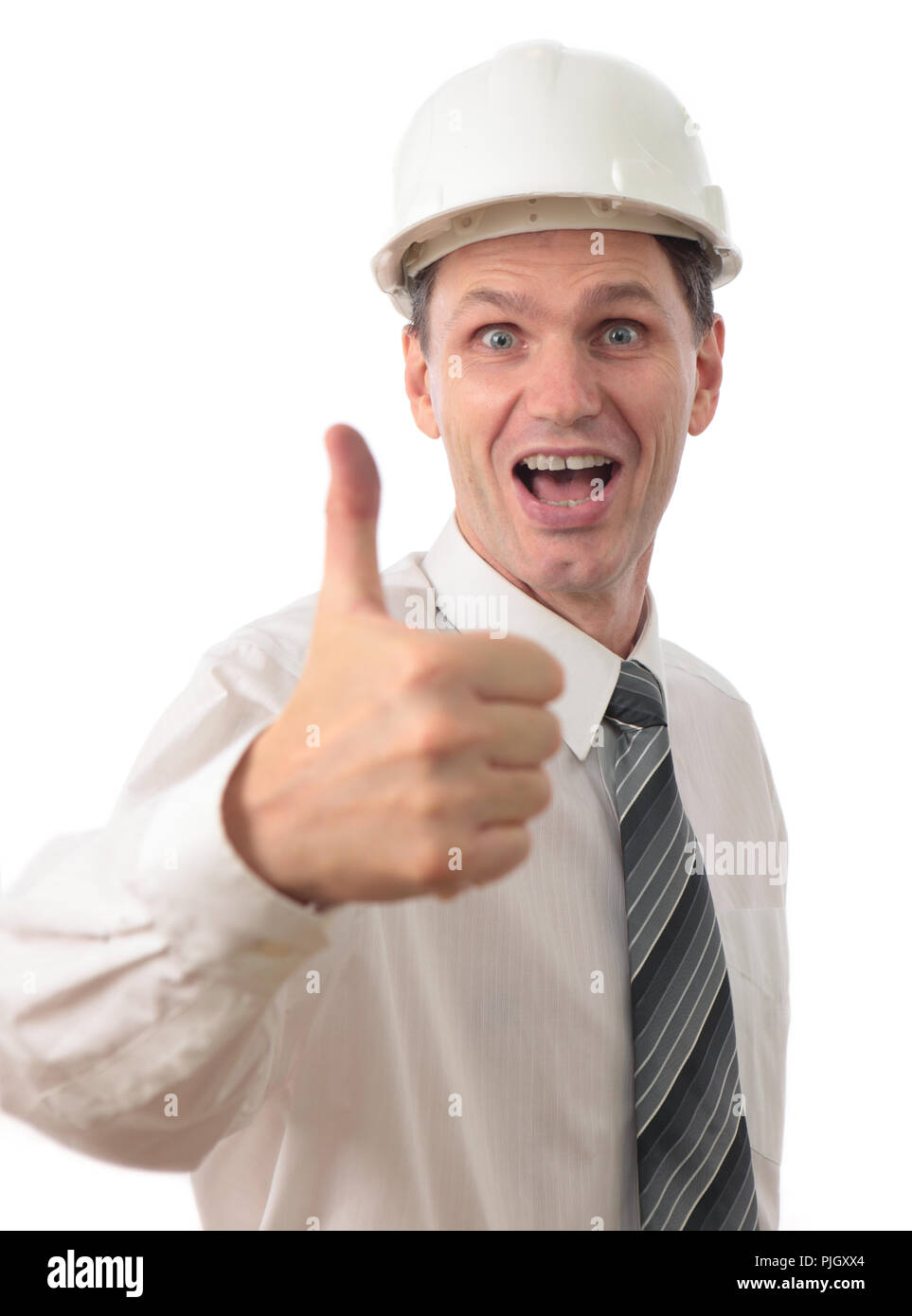 Engineer in a hardhat giving thumbs up sign against white background ...