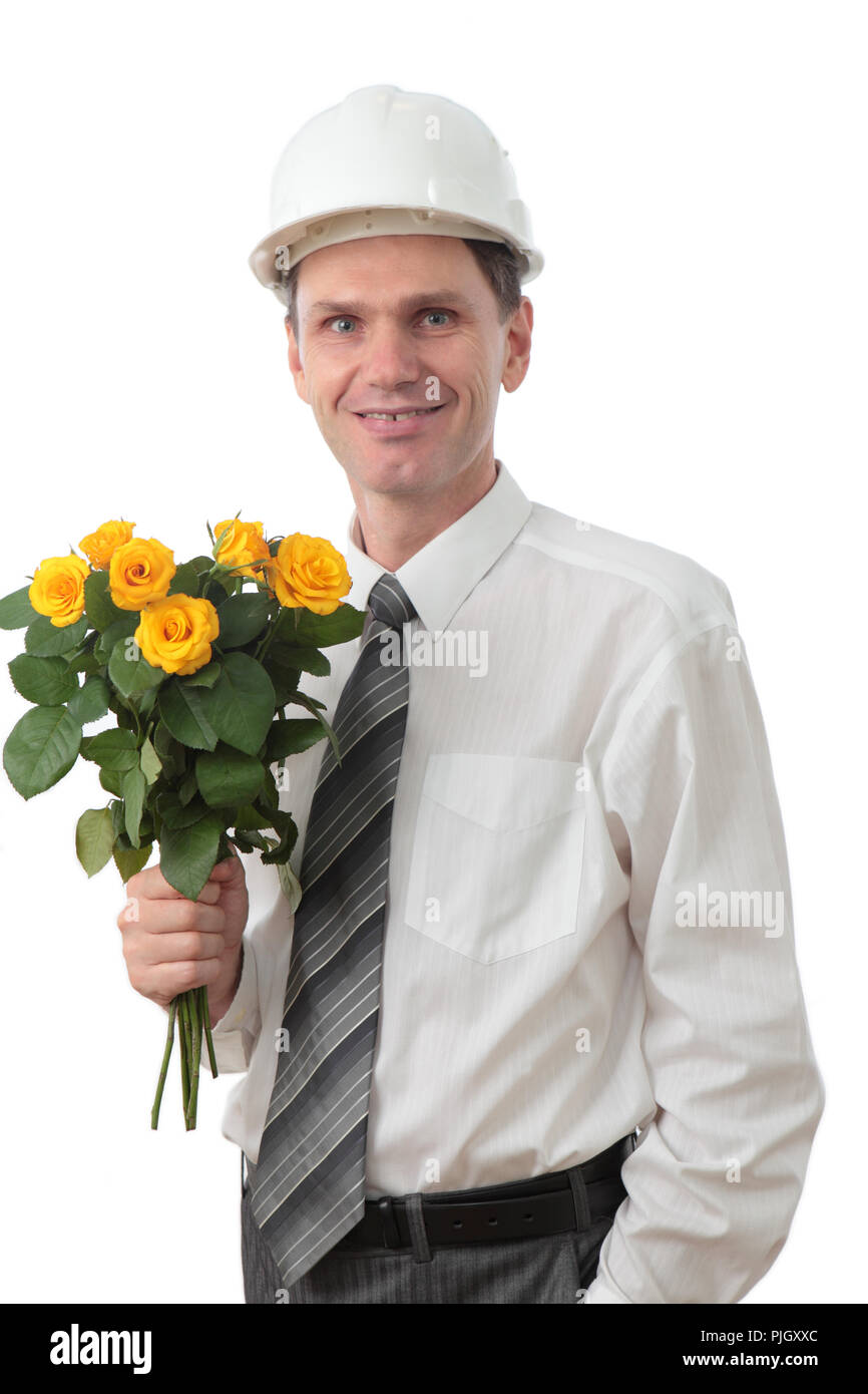 Engineer in a hardhat with flowers against white background Stock Photo ...