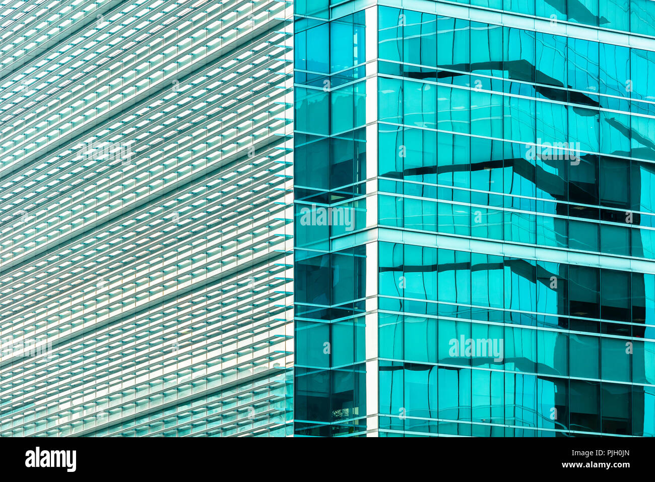 Simple, abstract, pastel color modern glassy office building exterior ...