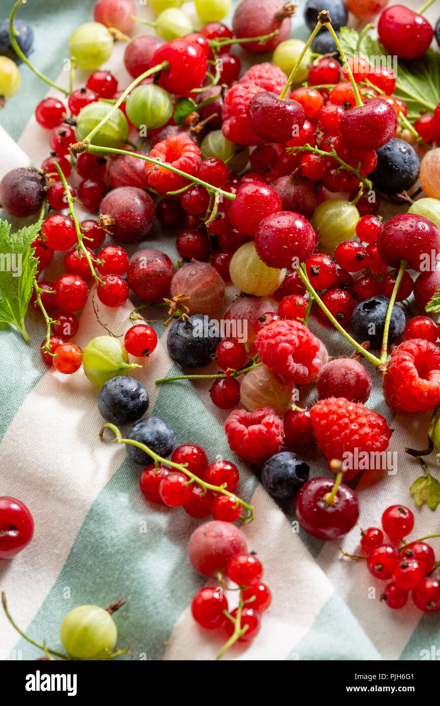 Fresh local berry mix Stock Photo - Alamy