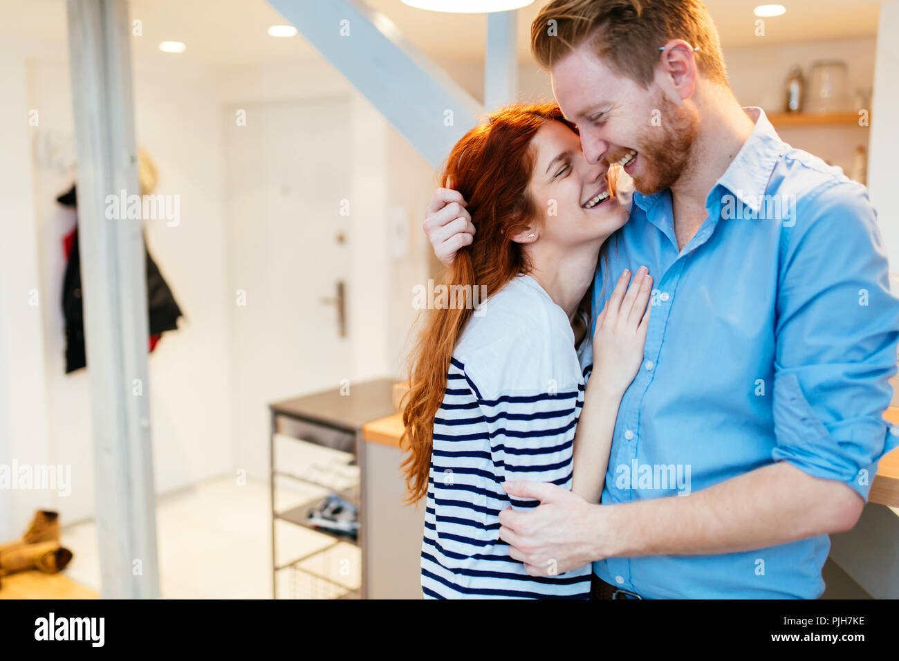Couple in love hugging Stock Photo - Alamy