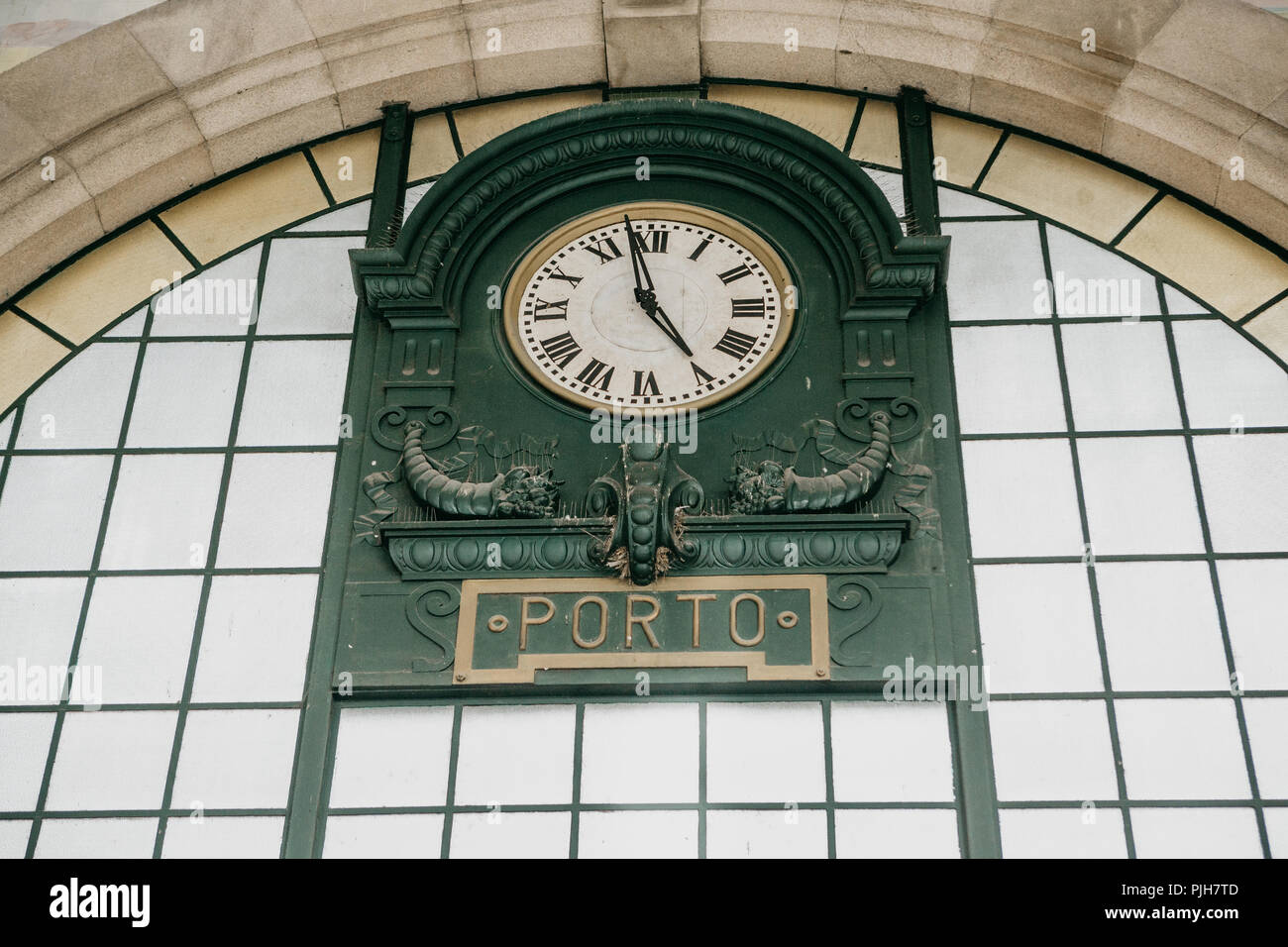 Old clock at railway station in Porto in Portugal Stock Photo - Alamy
