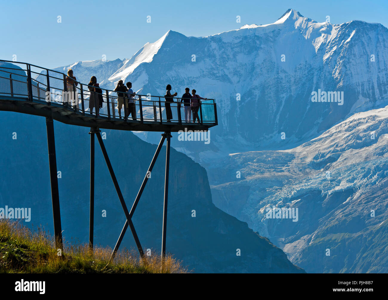Tourists on the observation deck of the First Cliff Walk by Tissot in ...