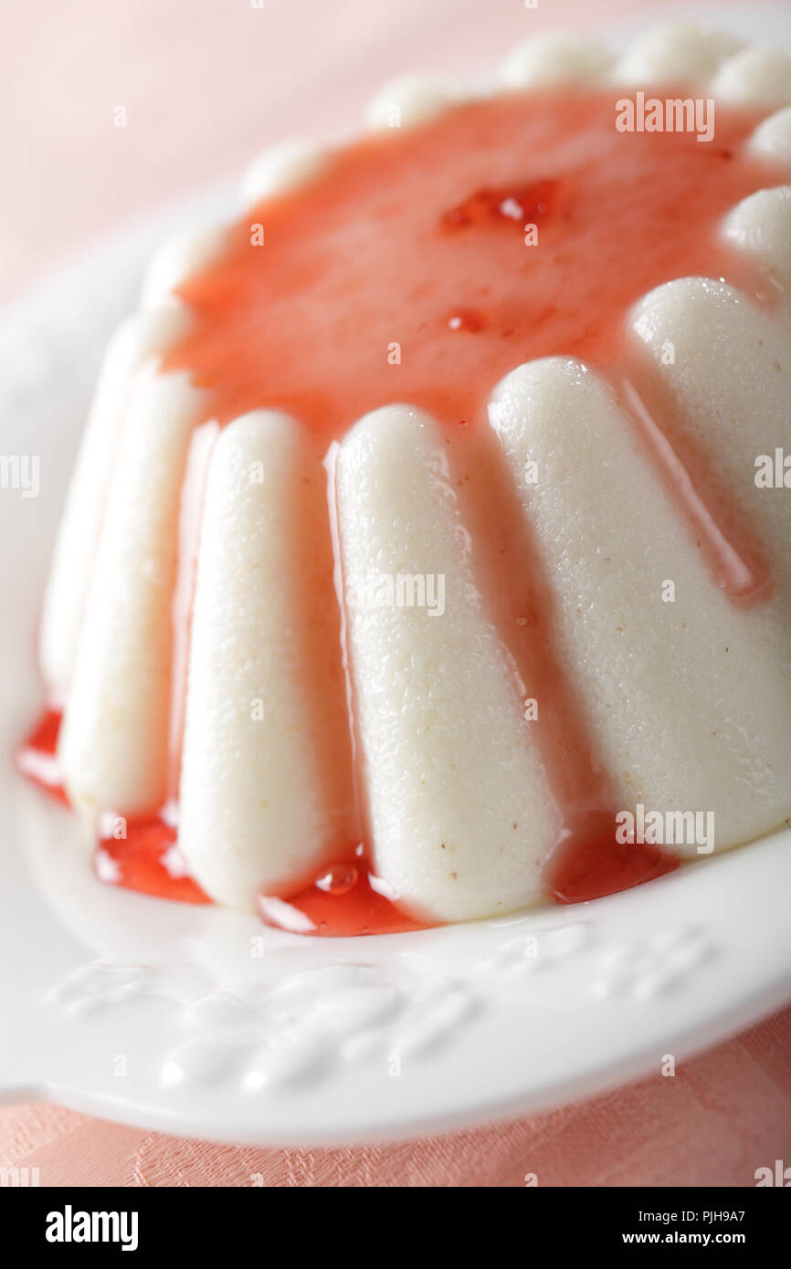Semolina pudding with strawberry jam closeup Stock Photo - Alamy